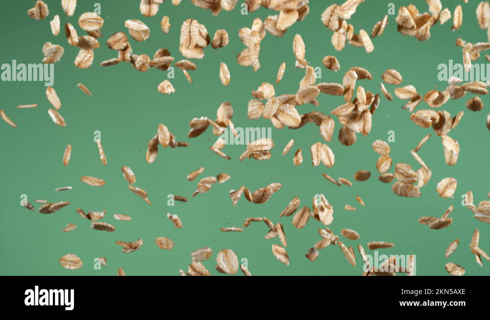 Oats falling in slow motion, green screen. Shot with Phantom Flex 4K ...
