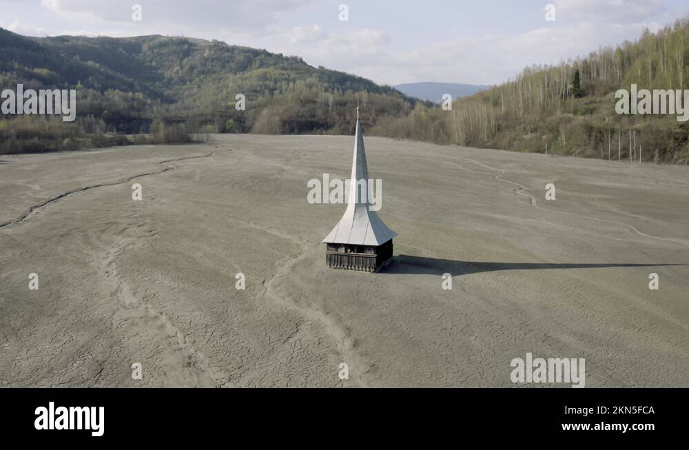 Rotating aerial of sunken church of Geamana in Romania Stock Video ...