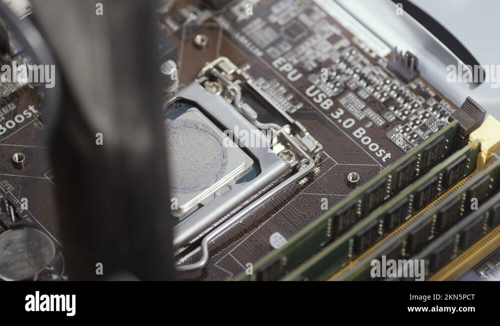 Cleaning dirty desktop computer processor and motherboard from dust ...