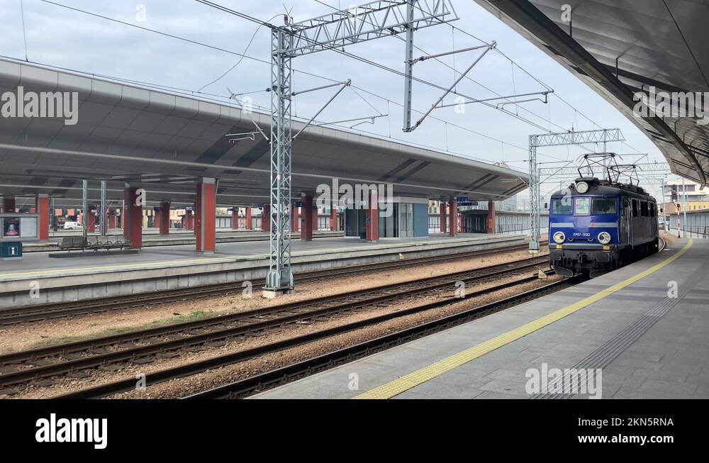Train Engine at the station on the track by the platform Stock Video ...