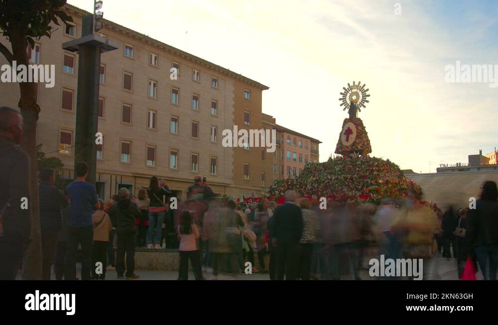 Devotees Offering Flowers At The Statue Of The Virgin Mary On Platform ...
