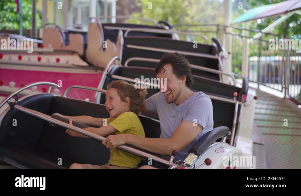 Family riding roller coaster Stock Videos & Footage - HD and 4K Video ...