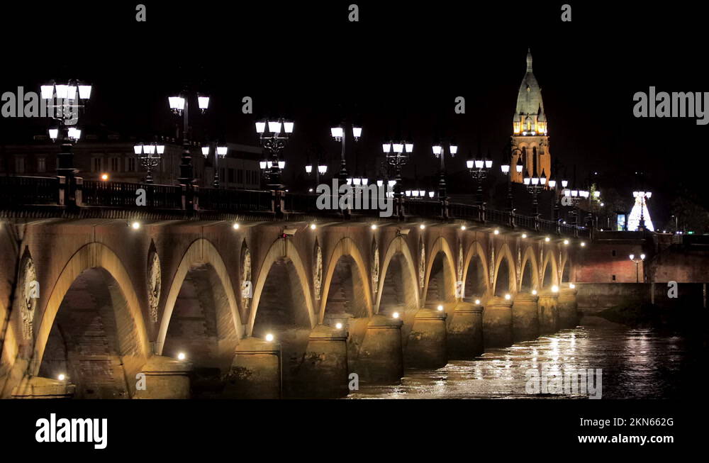 Pont de Pierre bridge at night and Eglise Sainte-Marie-de-la-Bastide ...
