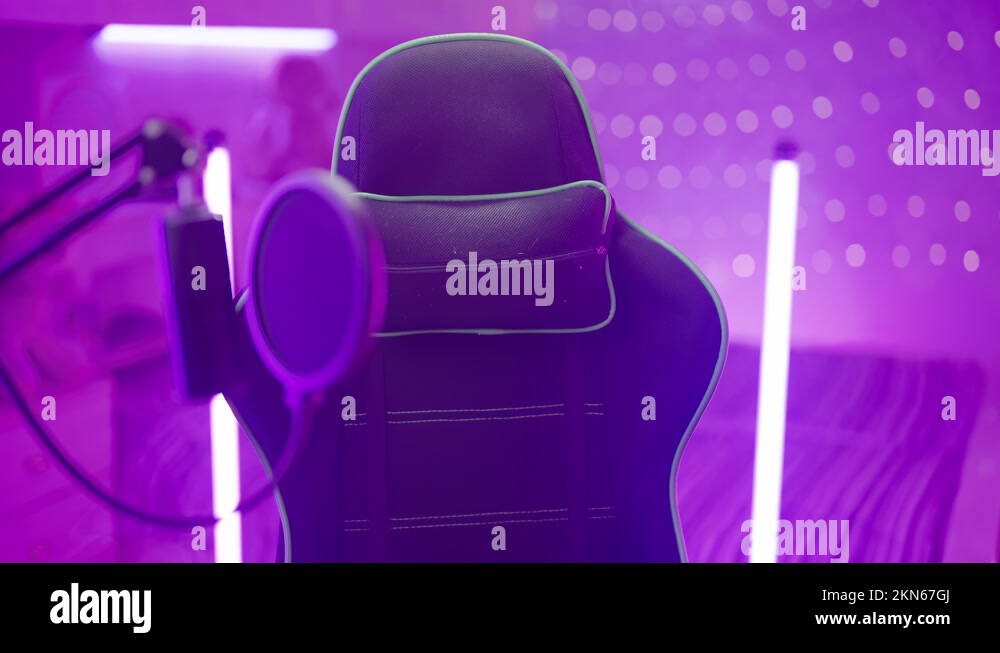 Empty moving gaming chair in pink room and haze neon lights 4K Stock ...