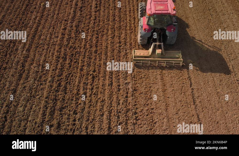 Tractor harrowing field in spring Stock Videos & Footage - HD and 4K ...