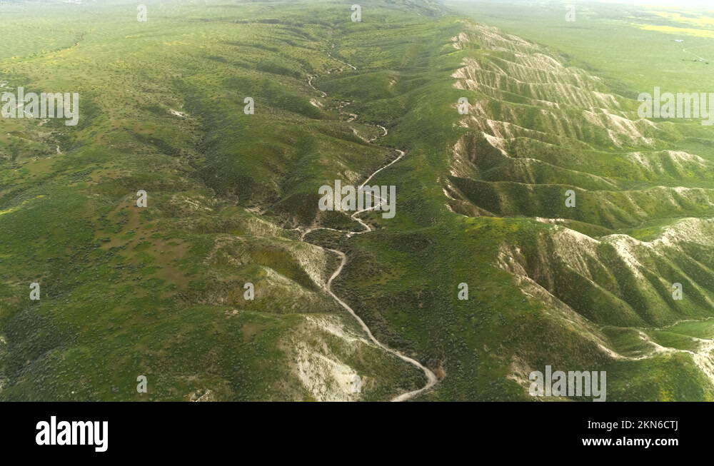 Cinematic aerial San Andreas fault with tectonic plates causing ...