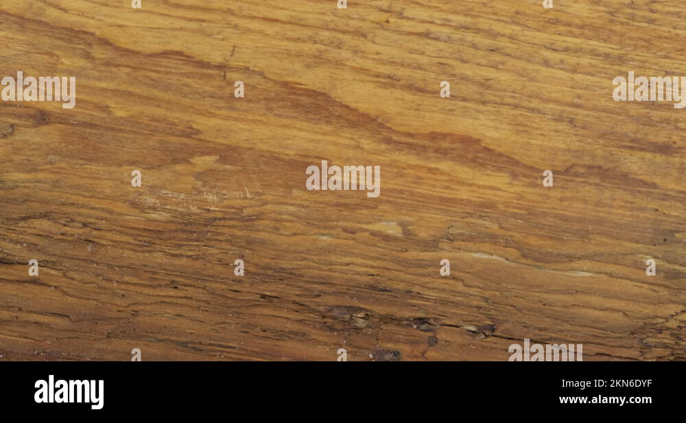 Rotation of an old wooden cracked board. The texture of the old wood ...