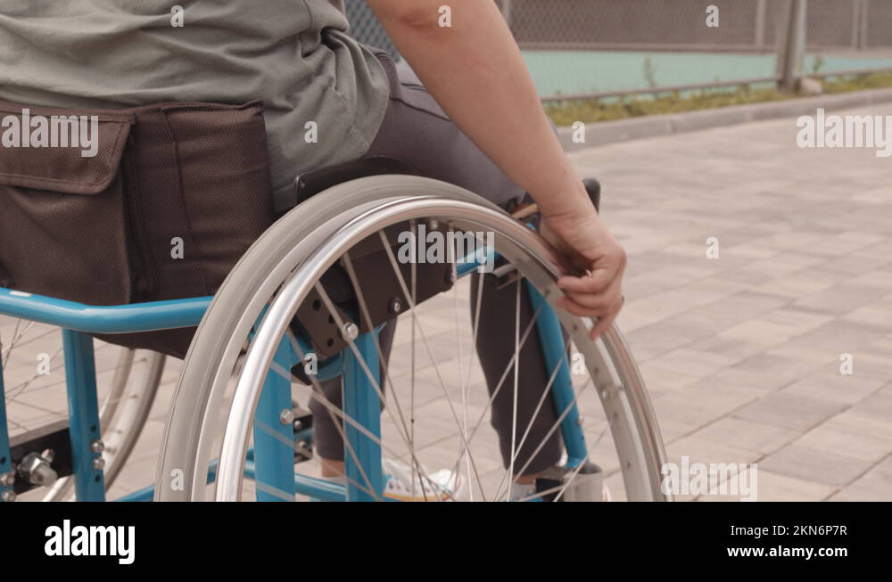 Pavement wheelchair Stock Videos & Footage - HD and 4K Video Clips - Alamy