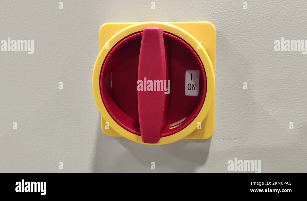 The hand turns on the red switch. The hand turns the red switch ...