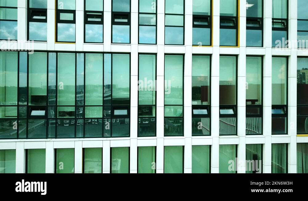 A modern hospital building with large mirrored windows Stock Video ...