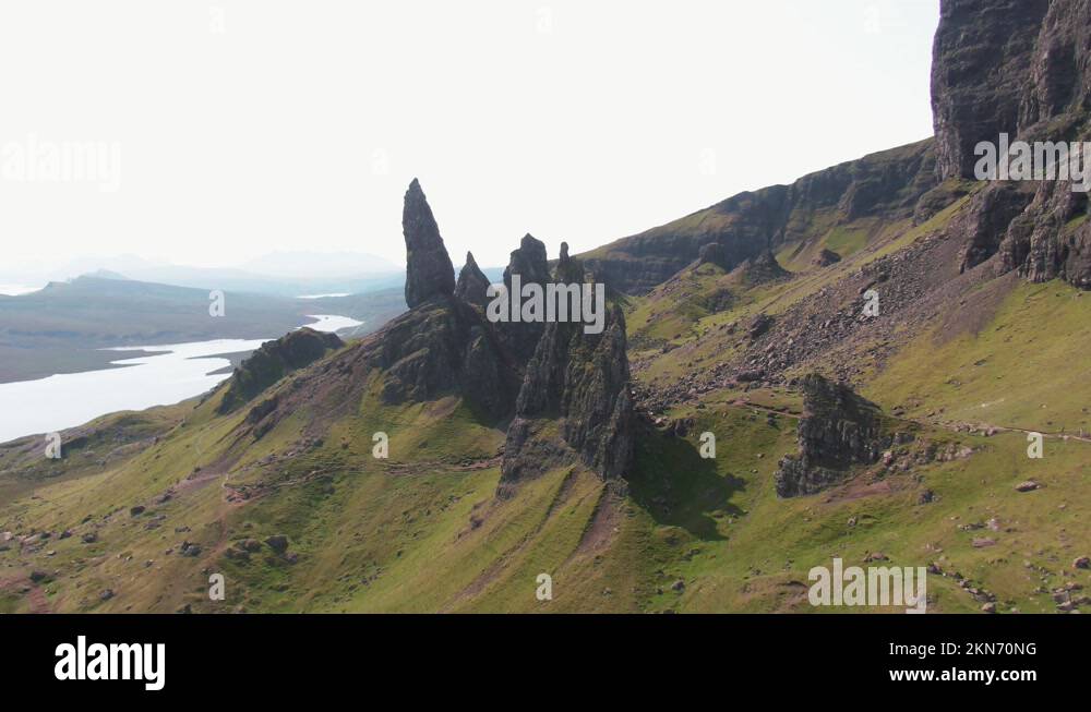 Panning Around Old Man Of Storr Isle Of Skye With Lush Green Grass And ...