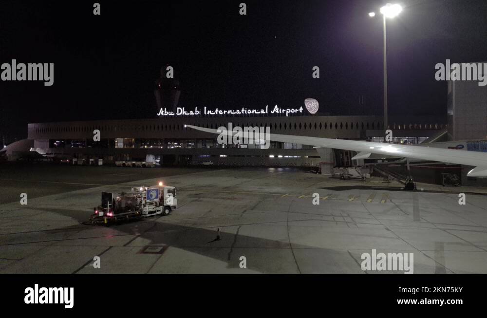 Abu Dhabi airport ground services ADNOC refueling aircraft plane in the ...