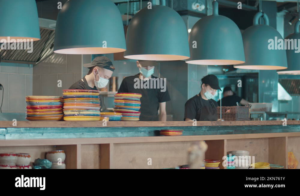 Teamwork concept, kitchen staff in a modern restaurant. Restaurant ...