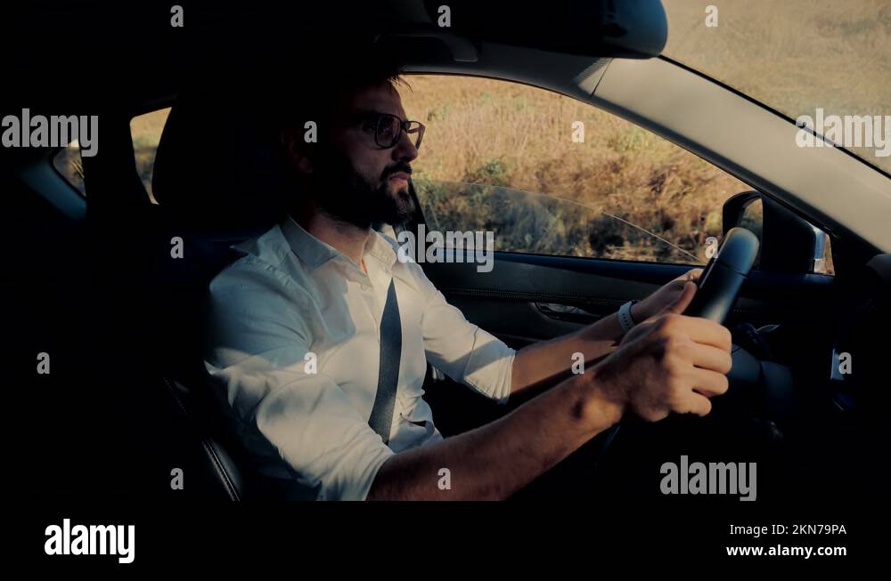 Driver Turning Steering Wheel In Car. Man Driving Auto. Car Driver ...