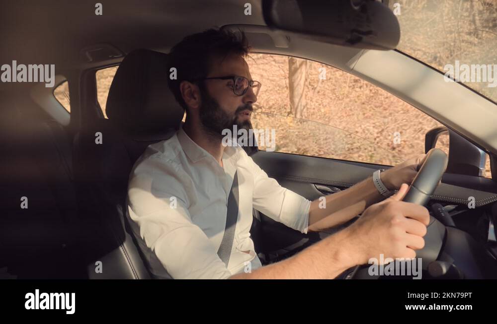 Driver Turning Steering Wheel In Car. Man Driving Auto. Car Driver ...