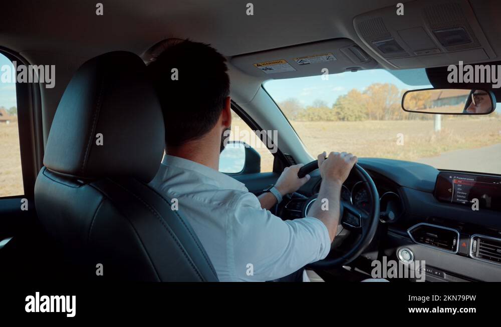 Driver Turning Steering Wheel.Man Driving Car And Holding Wheel Stock ...