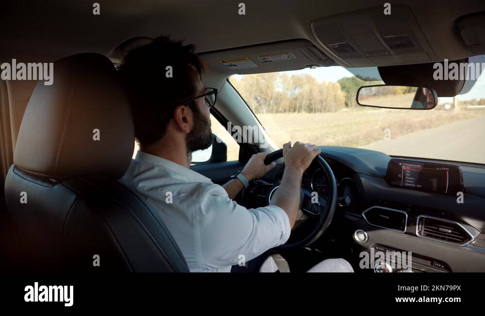 Driver Turning Steering Wheel.Man Driving Car And Holding Wheel Stock ...