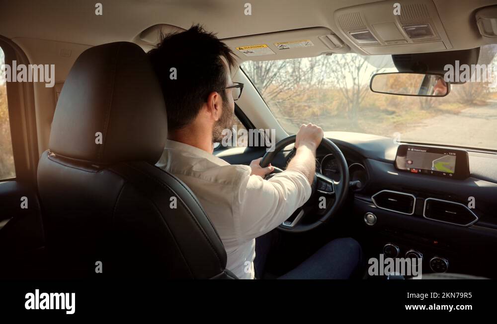 Driver Turning Steering Wheel In Car. Man Driving Auto. Car Driver ...