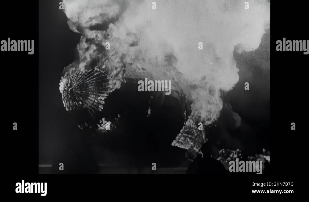 1940s: Blimp burns. Man gives speech in packed stadium. Franklin Delano ...