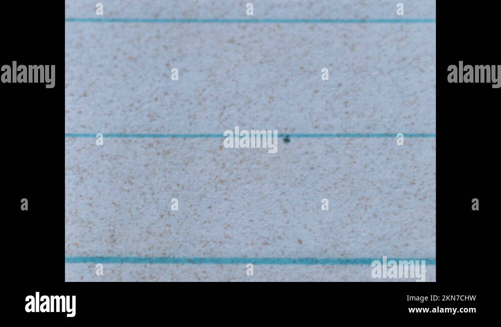 1960s: Numbers on paper. Extreme close up, hand writing letters on ...