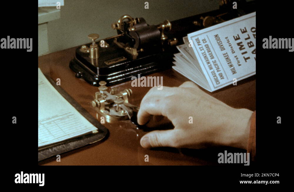 1950s: Hand uses an antique telegraph key to send a message. Telegraph ...