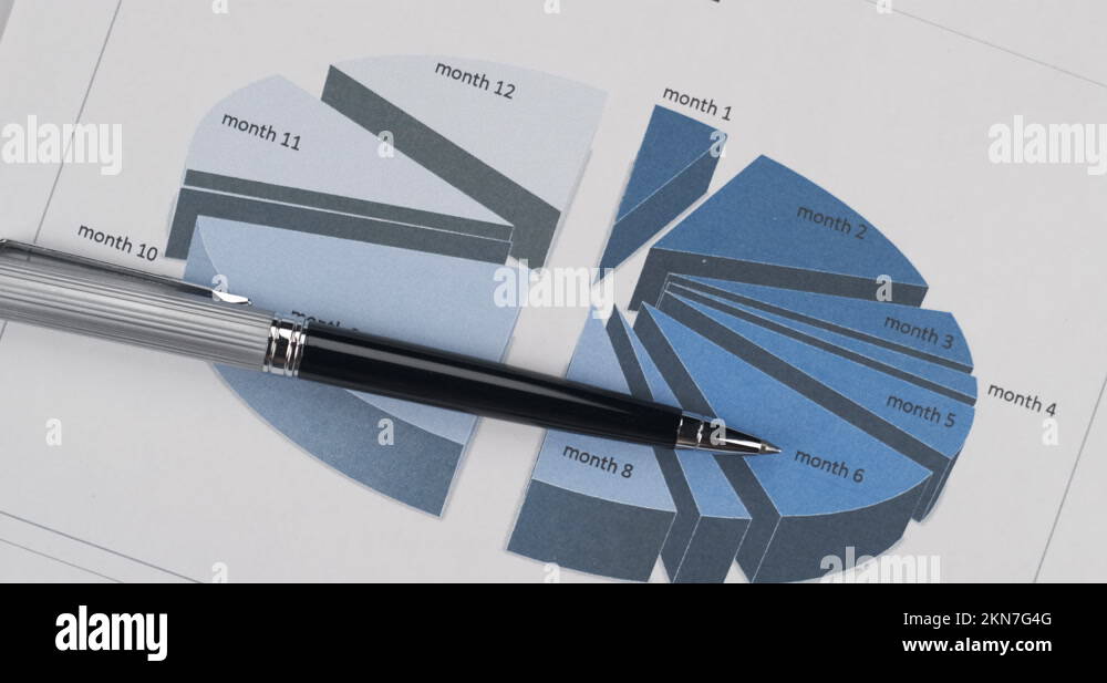 Rotation of a ballpoint pen lying on the blue diagram. Top view Stock ...