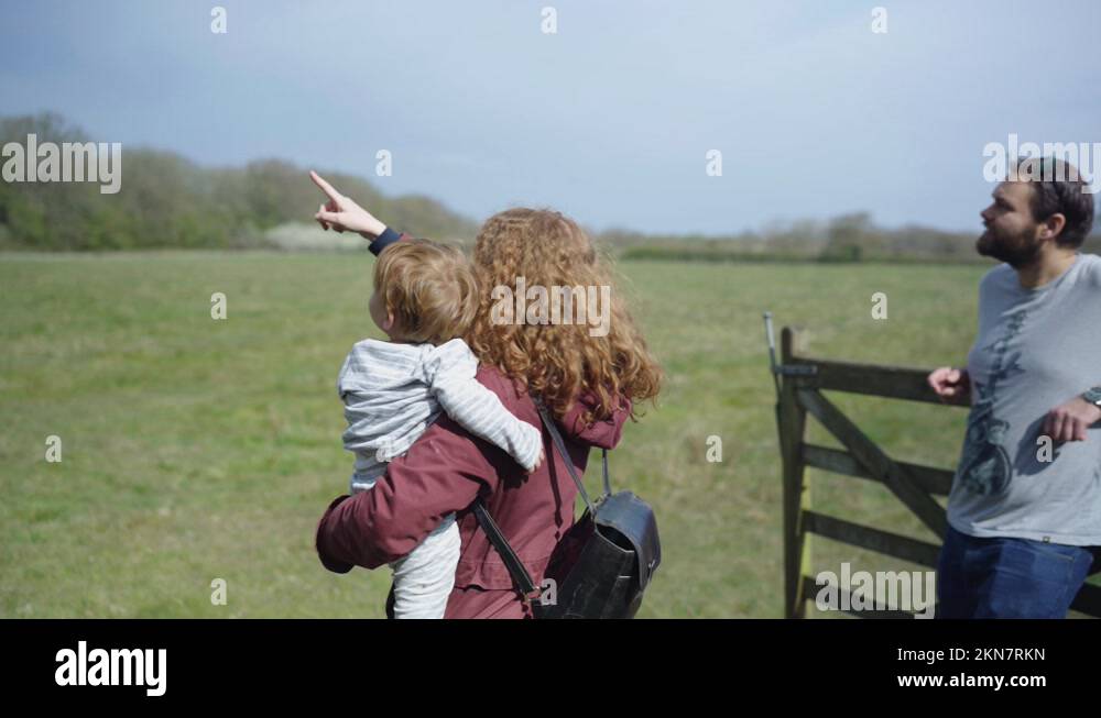 Man carrying child through field Stock Videos & Footage - HD and 4K ...
