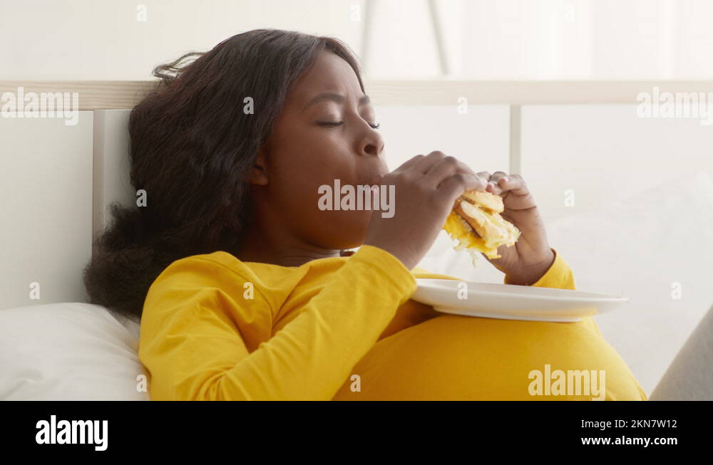 Junk food in bed Stock Videos & Footage - HD and 4K Video Clips - Alamy
