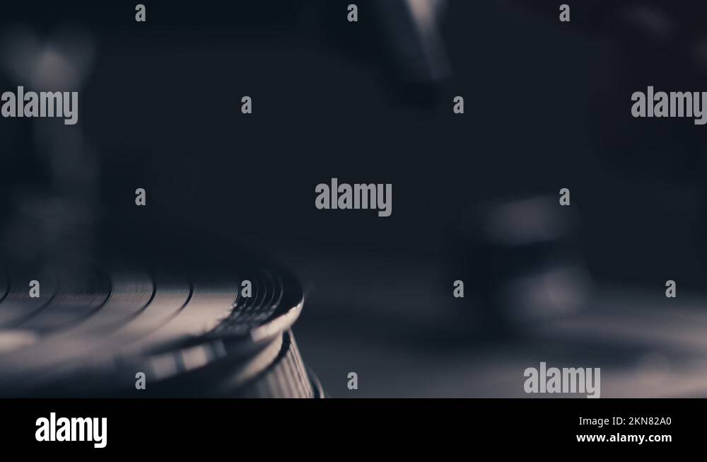 Male hand put needle on record spinning on turntable. Listening the ...