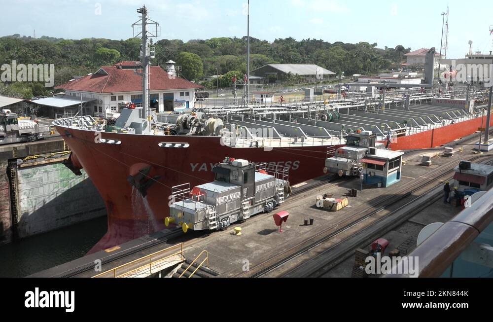 Panama. A cargo ship passes through the gates of the Panama Canal Stock ...