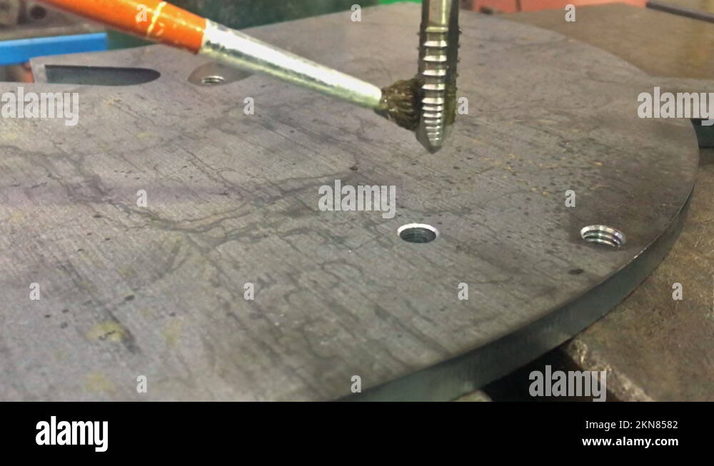 The process of threading in metal on a drilling machine Stock Video ...