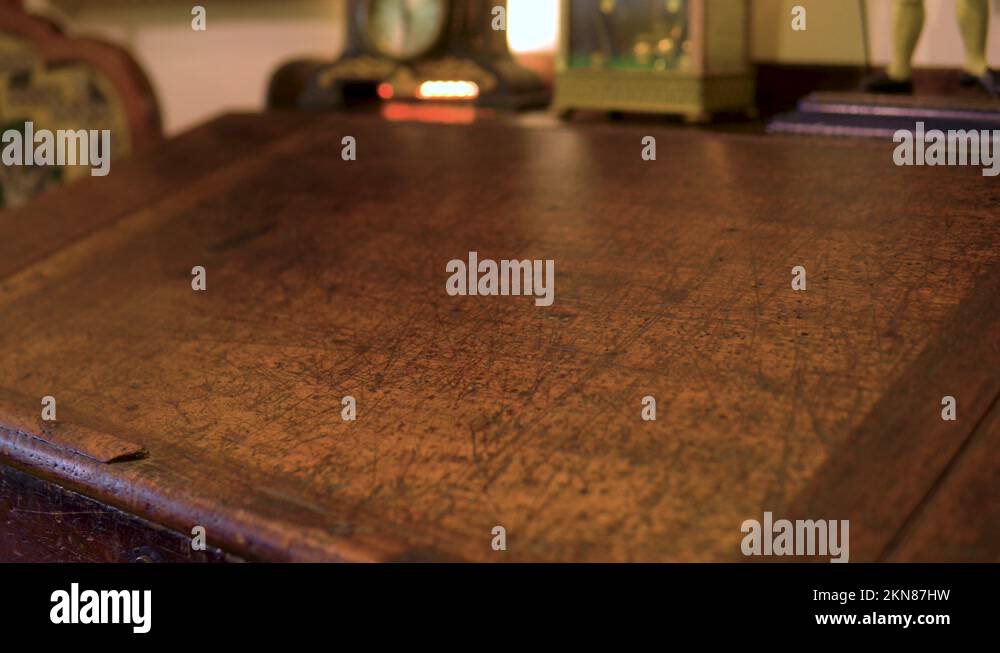 clsoe up of antique writing table visible marks scratches it was used ... clsoe up of antique writing table visible marks scratches it was used ...