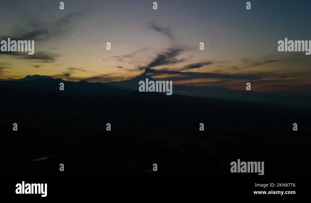Hyperlapse of volcanic ash eruption of Popocatepetl volcano at sunrise ...