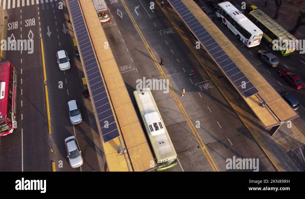 Aerila flyover bus station with arriving bus and walking people during ...