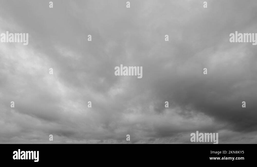 Time lapse of dramatic dark white clouds sky with thunder storm and ...