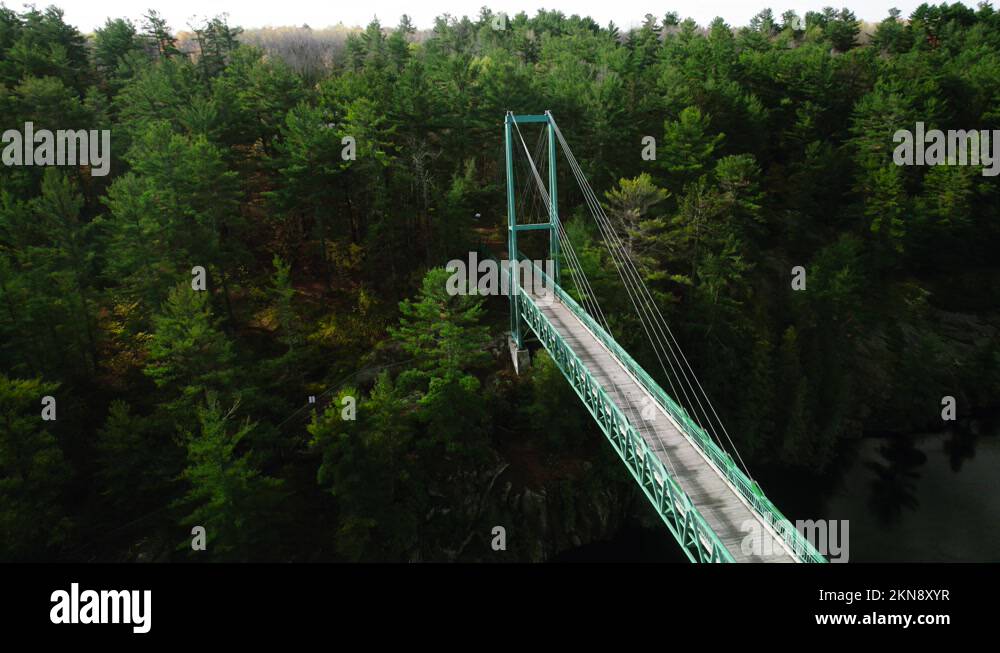 Pedestrian Snowmobile Suspension Bridge over French River crossing on a ...