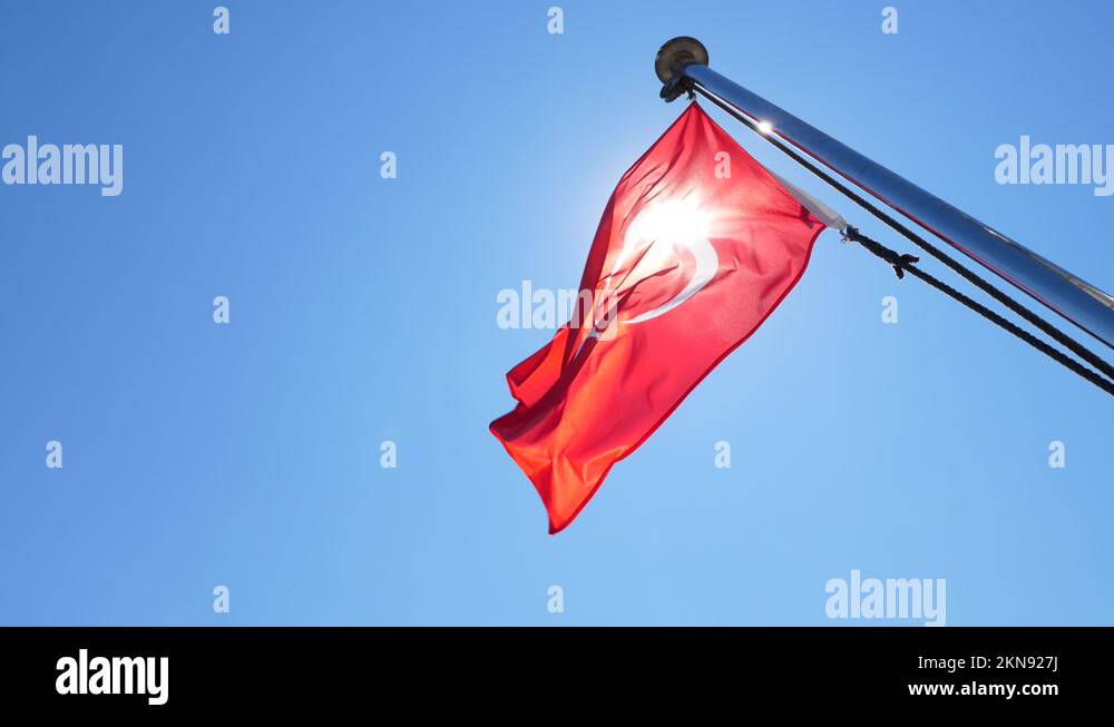Flag of Turkey flutter on wind, sun light flash, shine through fabric ...