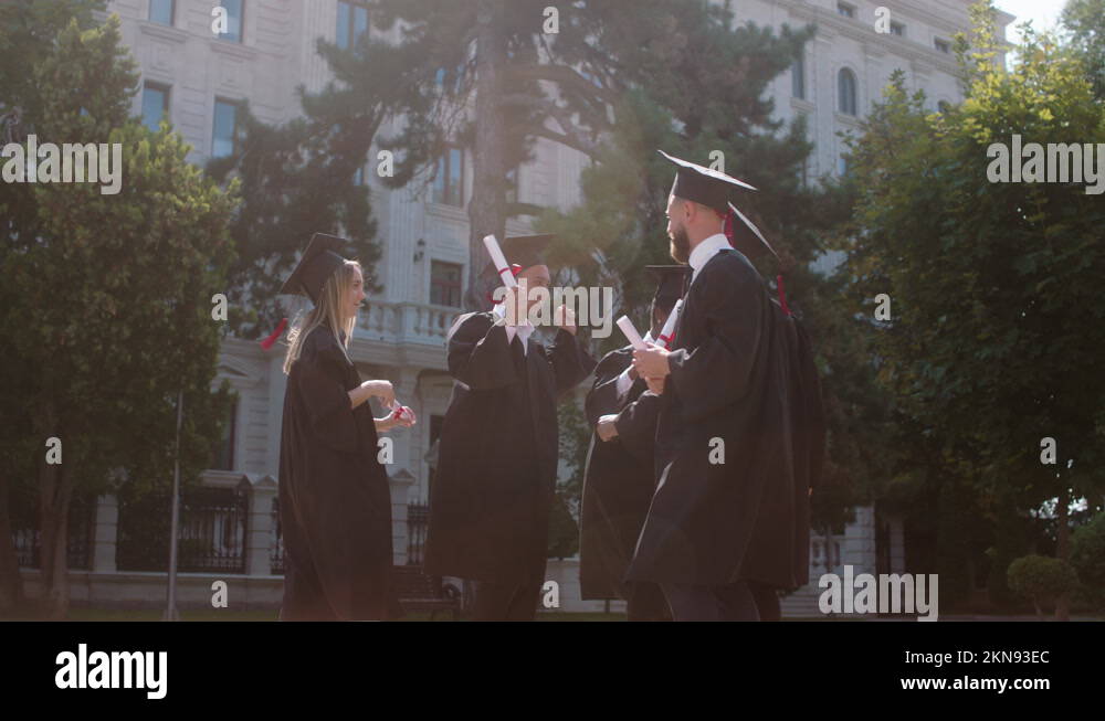 Great day for a group of students graduates multiracial wearing ...