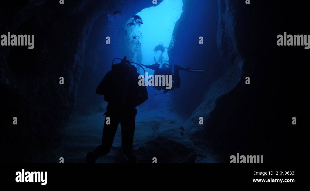 cave diving underwater exploring caves ocean sun beams and rays ...
