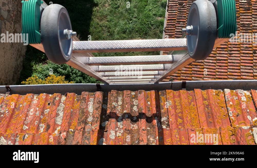 Roof step ladder Stock Videos & Footage - HD and 4K Video Clips - Alamy