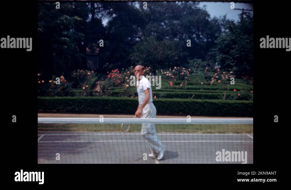 1950s: Slow motion view of a man shifting from a backhand to a forehand ...