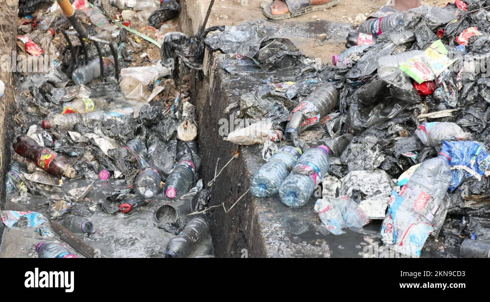 Sewer trash garbage cleaning ditch drain poverty area Accra Ghana 4K ...