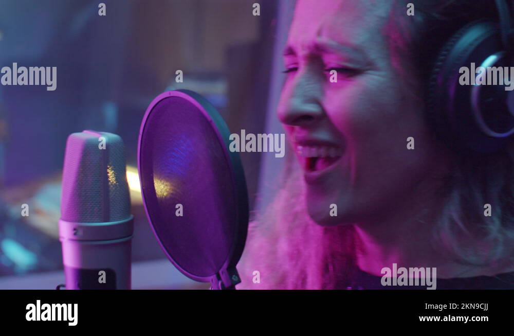 Female Vocalist Singing in Mic in Recording Studio Stock Video Footage ...