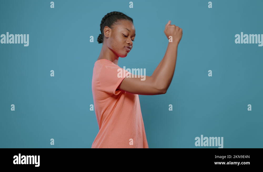 Muscular woman flexing arm Stock Videos & Footage - HD and 4K Video ...