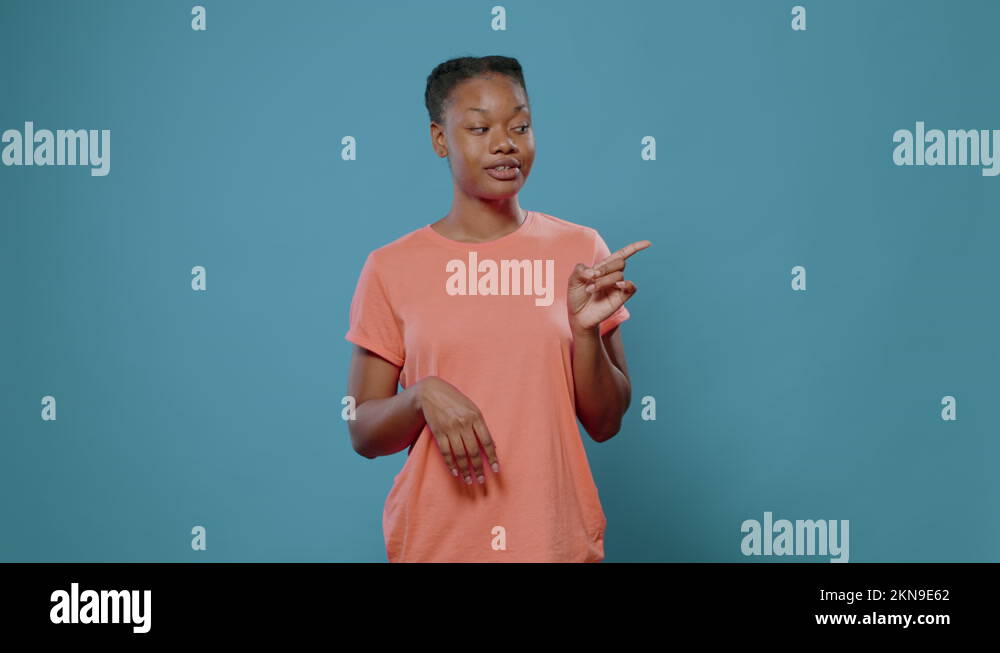 Young adult indicating left and right direction with hands Stock Video ...