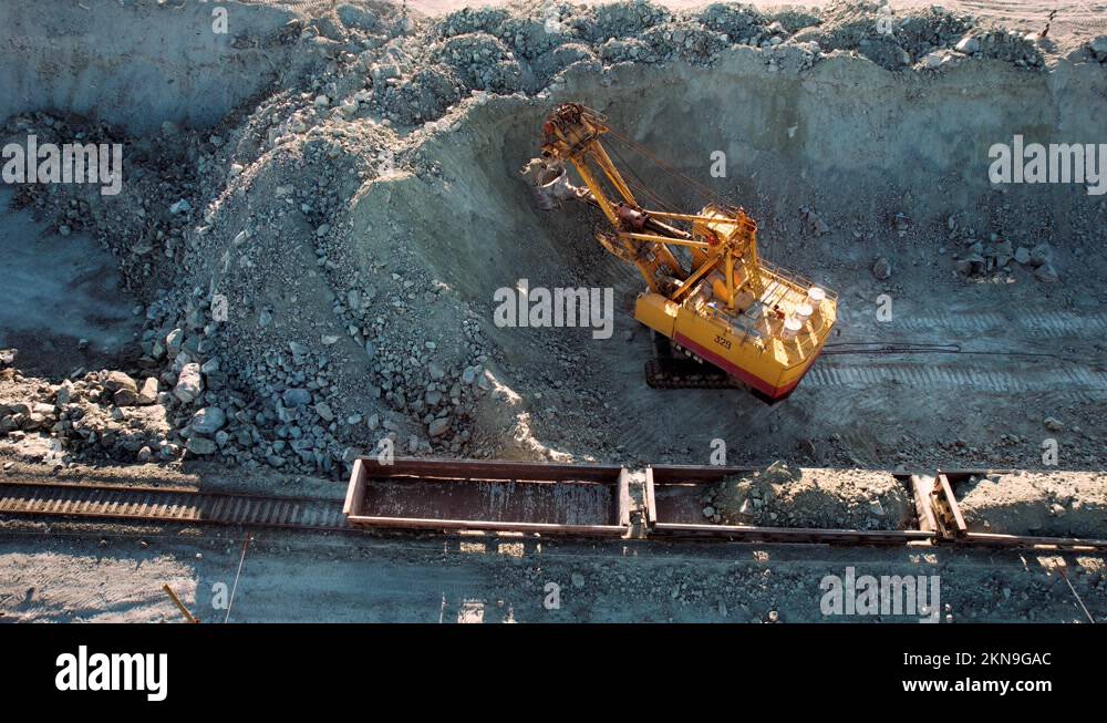 Excavator quarry loading train iron ore industry mining Stock Video ...