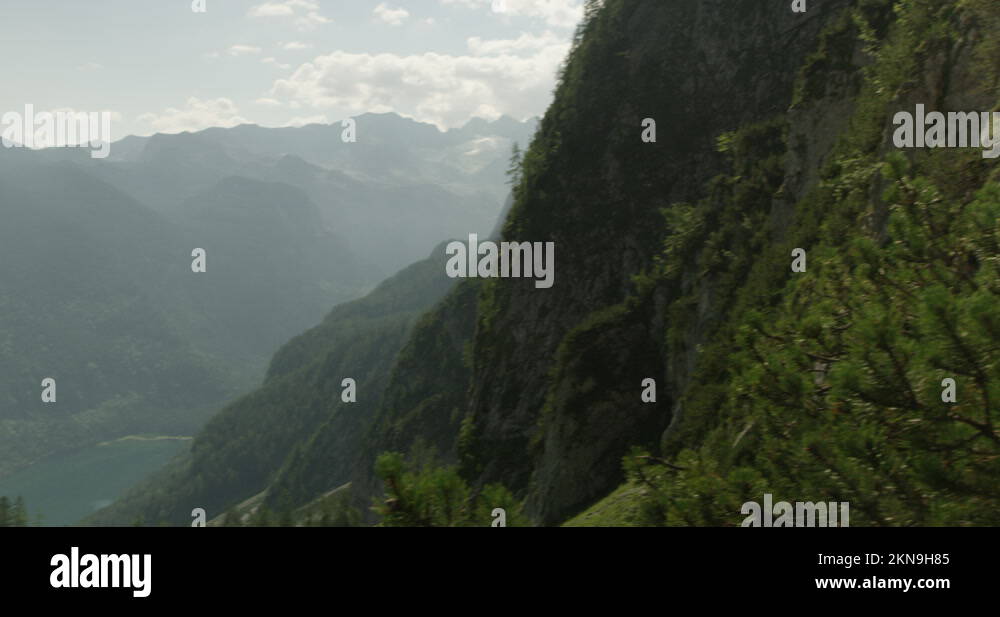 Extreme via ferrata cliff walk hiking with steel cable mountainside ...