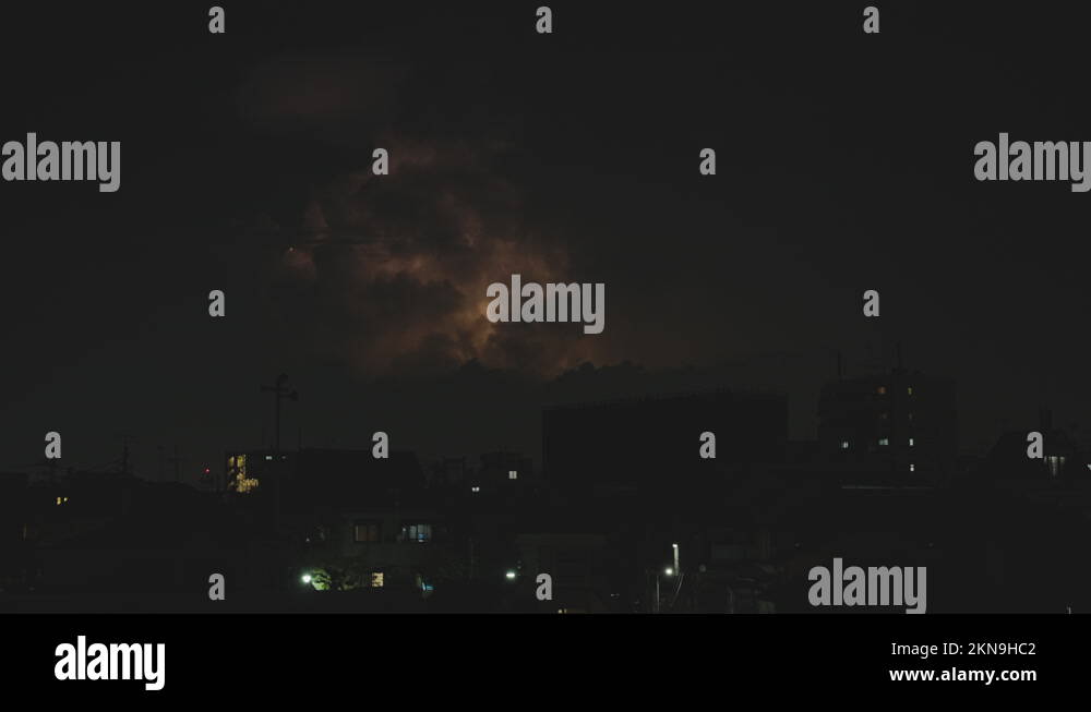 Beautiful display of lightning in the night sky over Tokyo, Japan -Wide ...