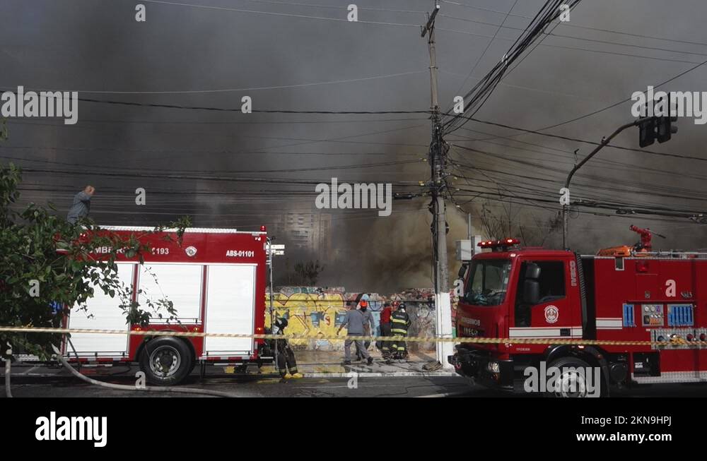 Fire Engines In Front Of Hazardous Fire Disaster That Burnt A ...