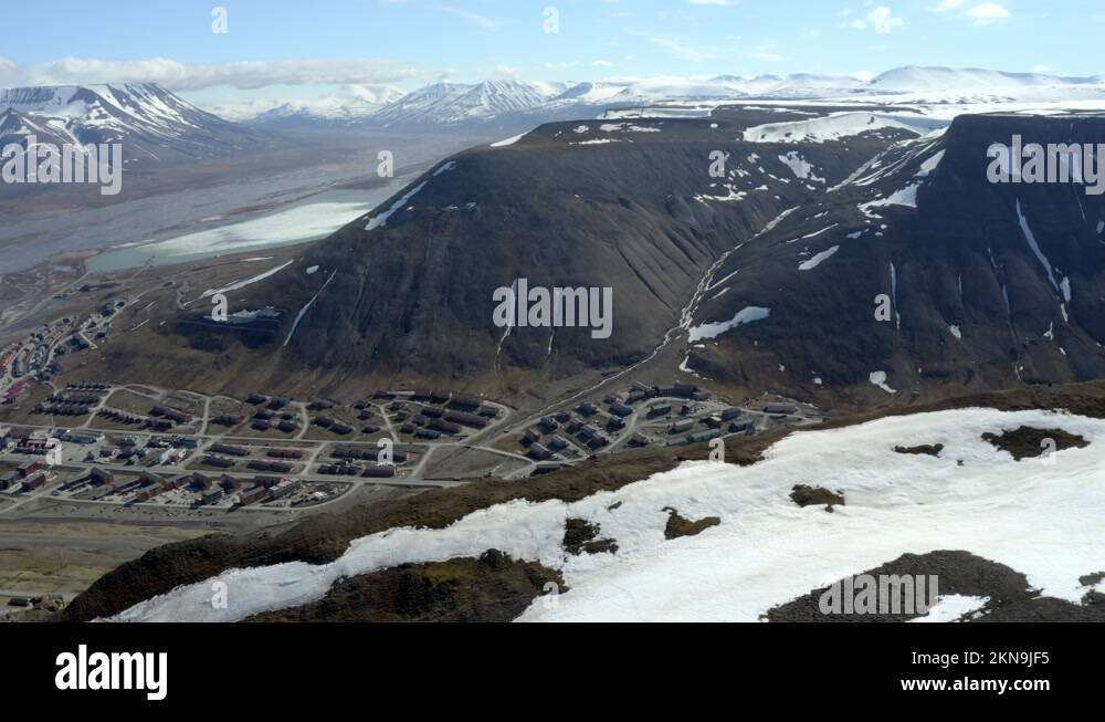 Sliding shoot - city reveal. Norway - Longyearbyen. Svalbard. Sliding ...